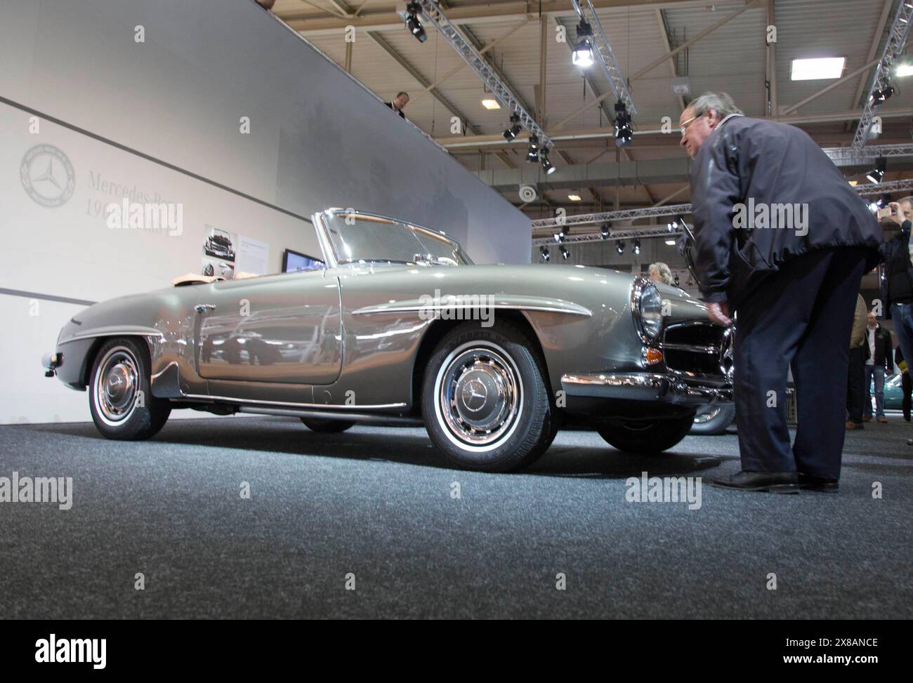 A Mercedes convertible is on display at Techno Classica, the trade fair ...