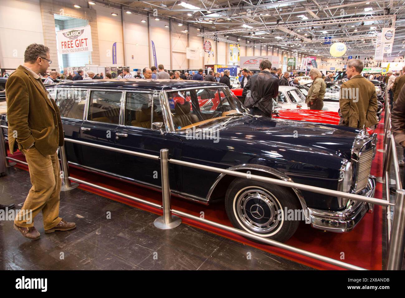 Visitors to Techno Classica take a look at a Mercedes Benz 600. Techno ...