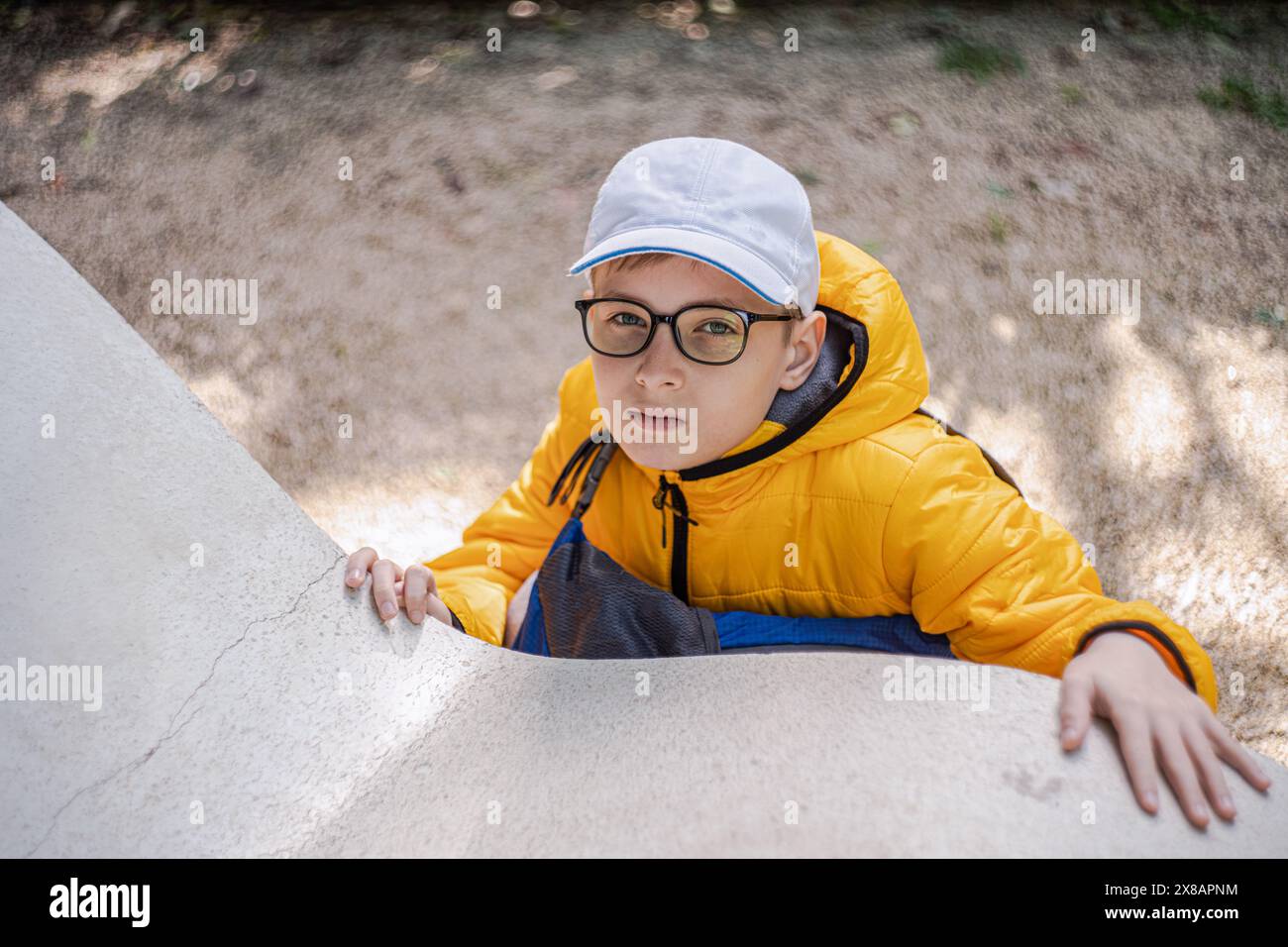 Beautiful teenager boy in glasses Stock Photo - Alamy