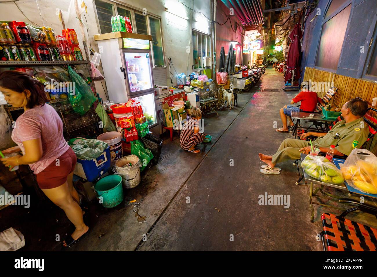 Street food restaurant in the streets of Saigon in Vietnam Stock Photo ...
