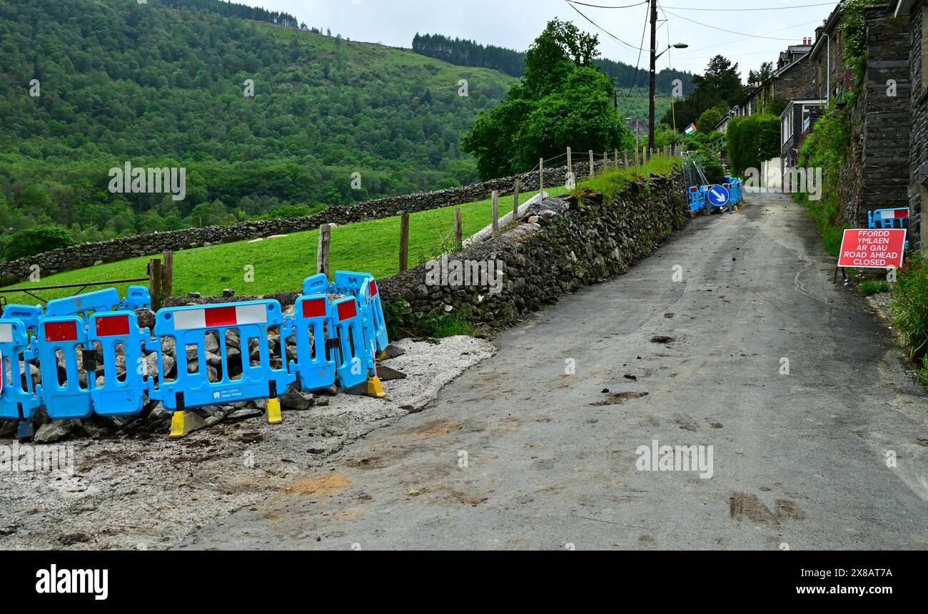 Emergency burst water mains repairs in small village in Gwynedd Wales ...