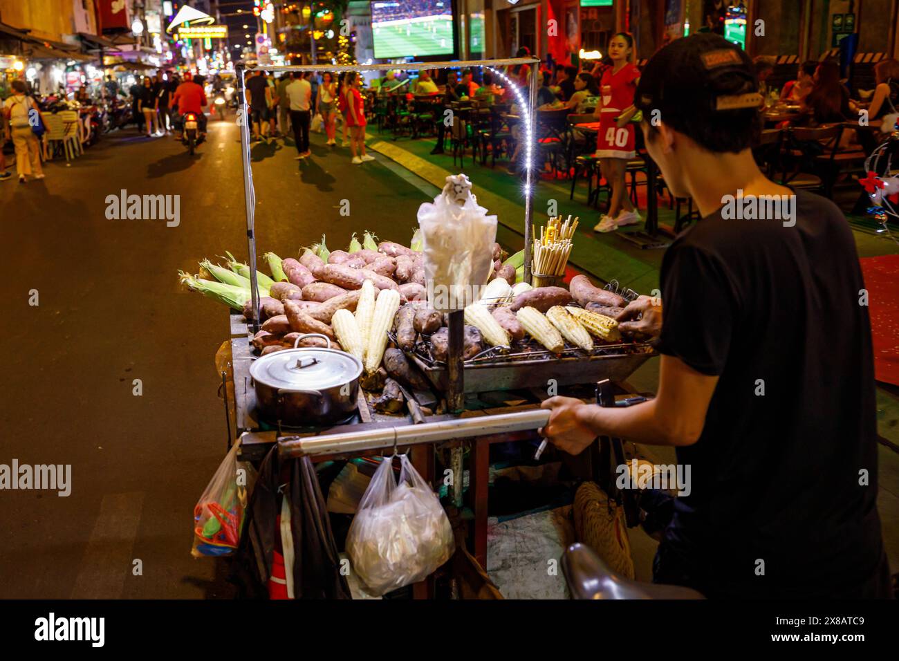 Street food restaurant in the streets of Saigon in Vietnam Stock Photo ...