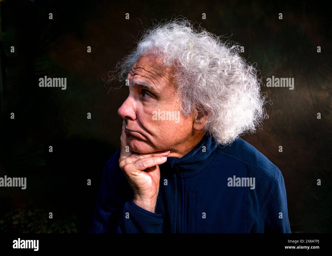 69 year old man with crazy hair making expression Stock Photo - Alamy