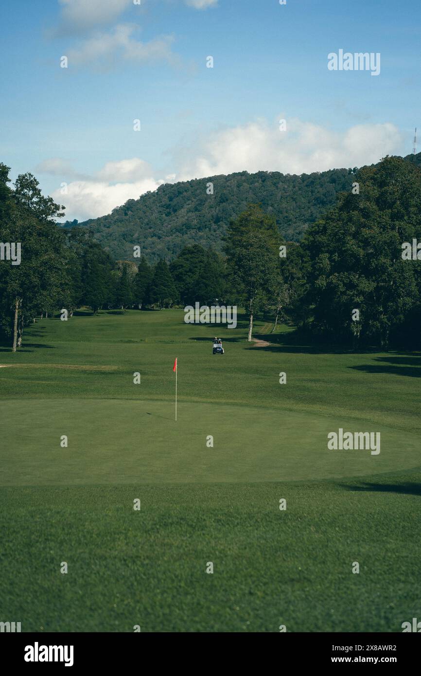 Golf course. People play golf. Bali, Bedugul Stock Photo - Alamy