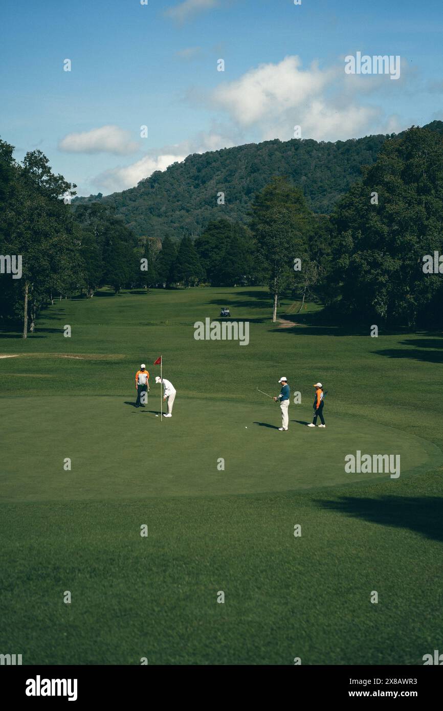 Golf course. People play golf. Bali, Bedugul Stock Photo - Alamy