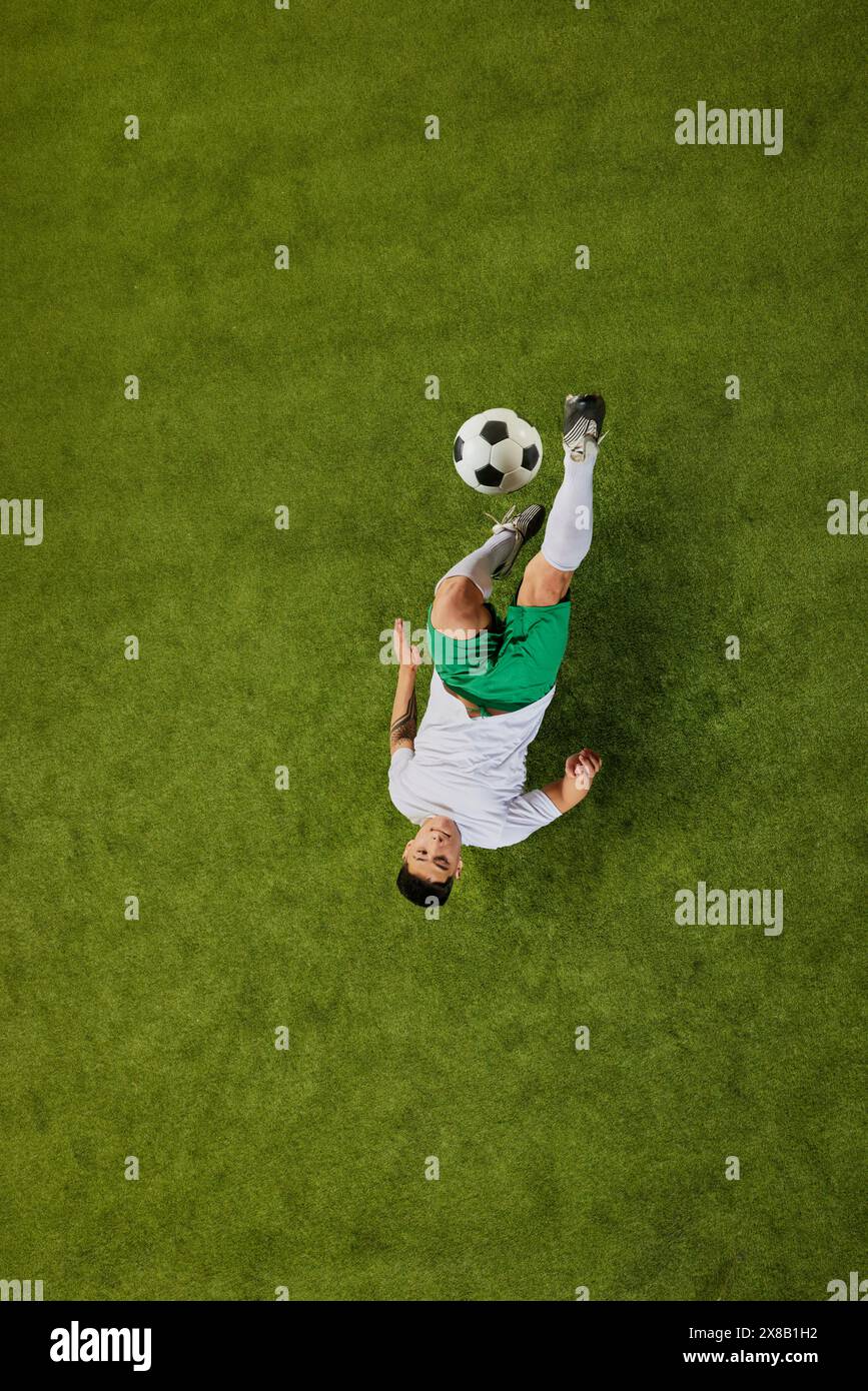 Football action aerial jump hi-res stock photography and images - Alamy