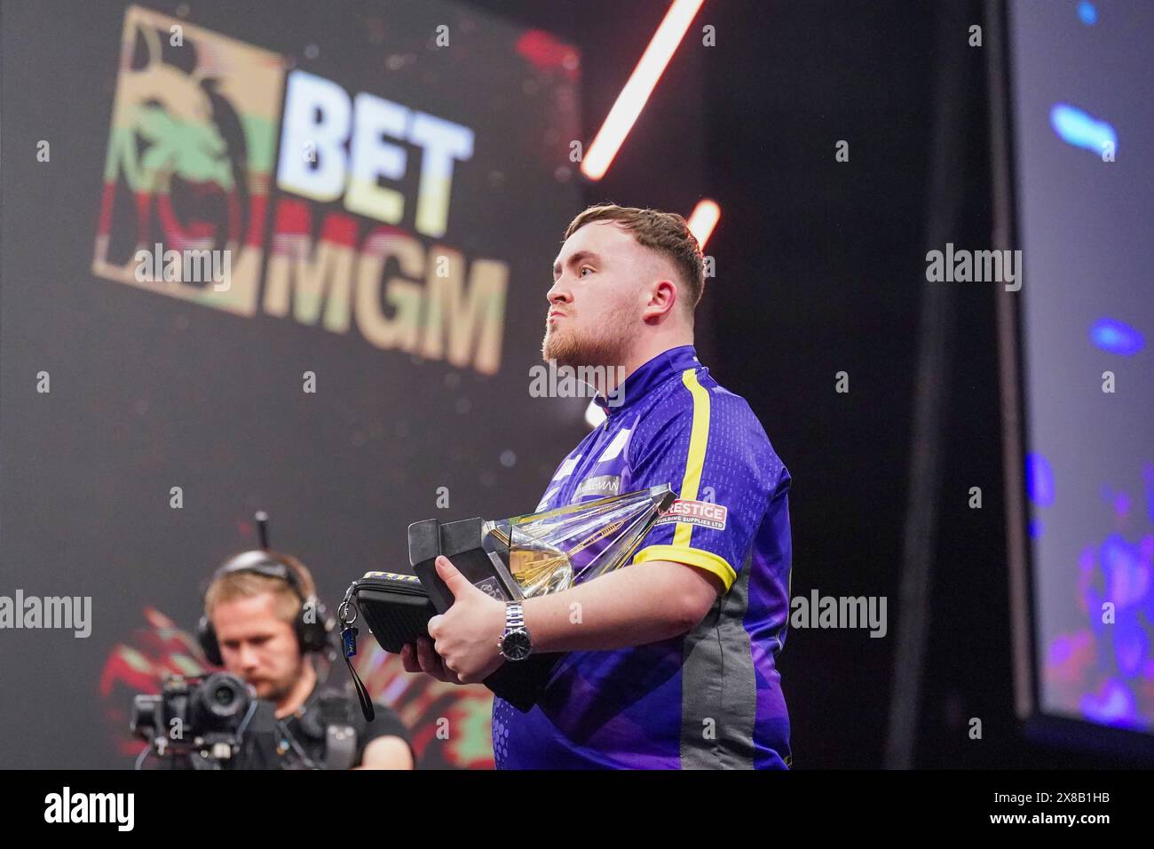 London, UK. 23rd May, 2024. Luke Littler with trophy and darts case ...