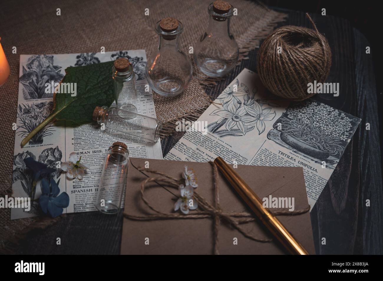 Mystical still life in vintage style with empty flasks, letters and ...