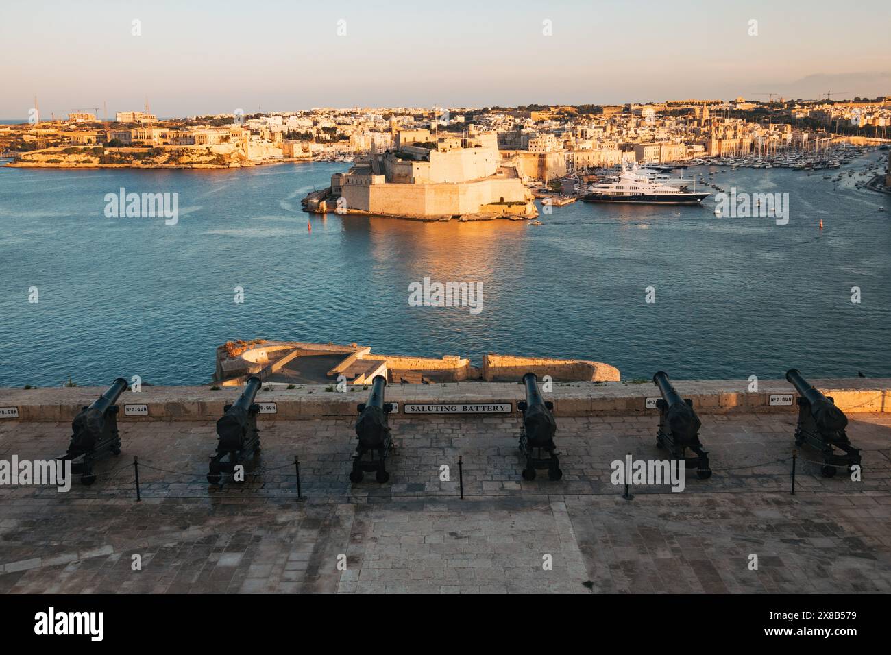 A row of cannons at the Saluting Battery point towards Valletta Harbor ...