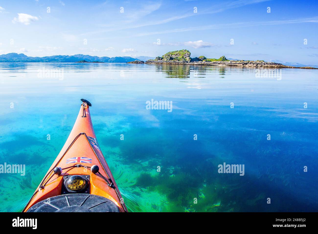 Sea kayaking in the Sound of Arisaig on Scotland's west coast Stock ...