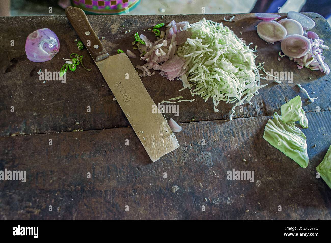 08 29 2008 working with Choping bord in traditional rural kitchen. at ...