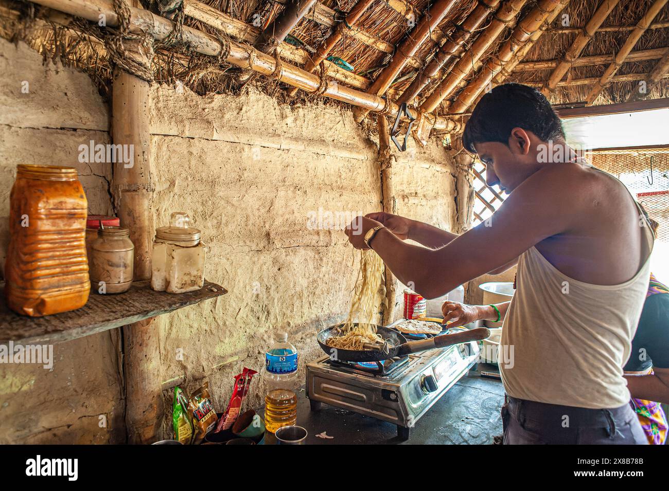 Asian man cooking traditional veg hi-res stock photography and images ...