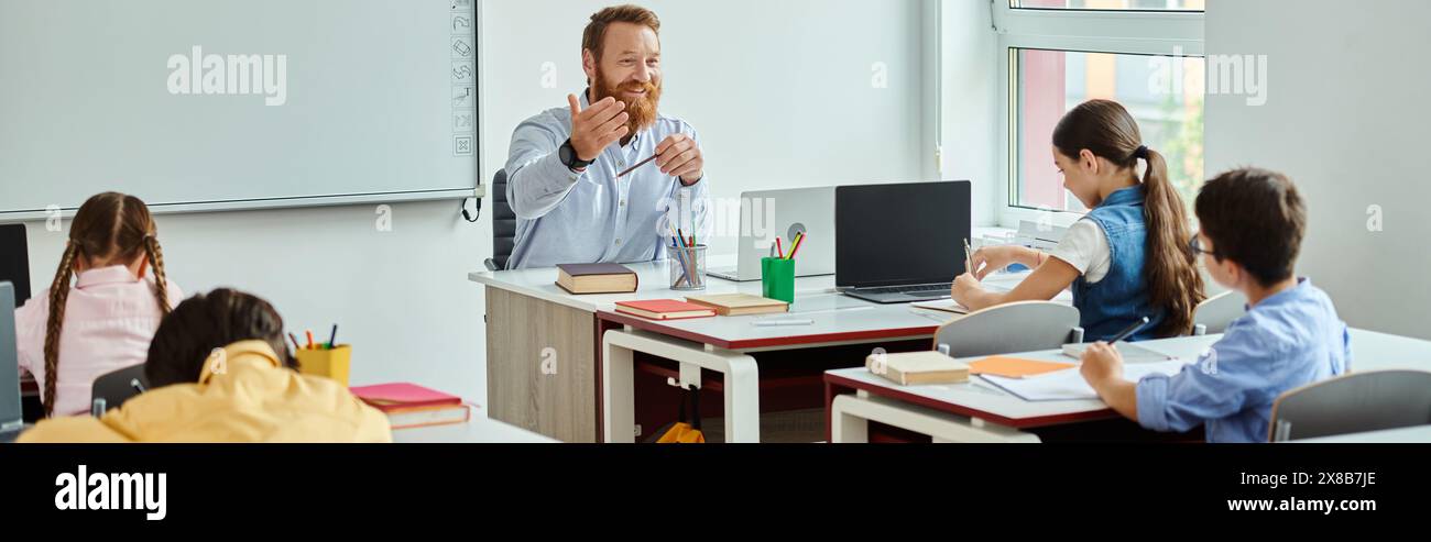 A man teacher stands confidently in front of a group of kids in a ...