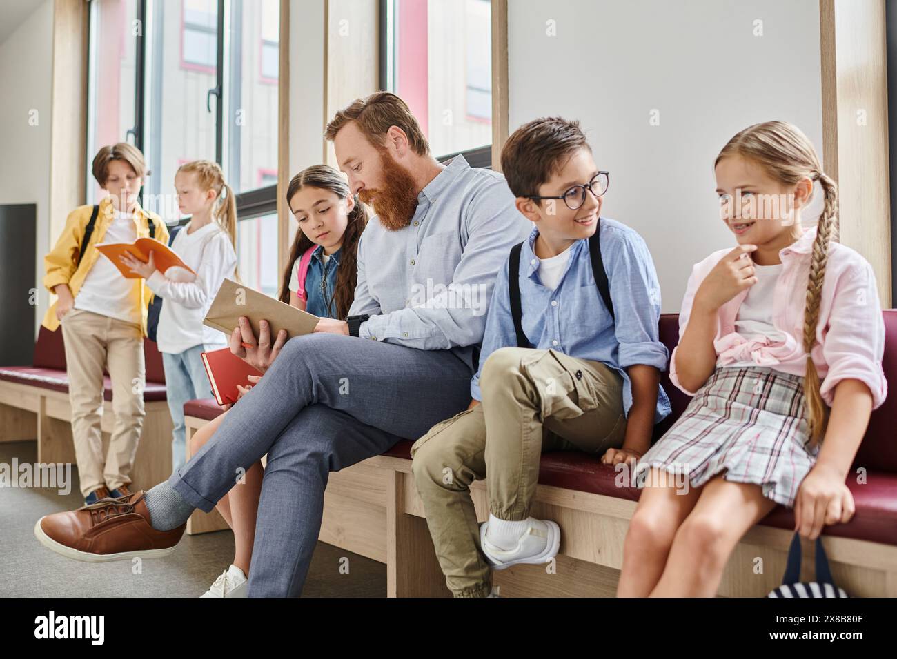 Girls and boys sitting together hi-res stock photography and images - Alamy
