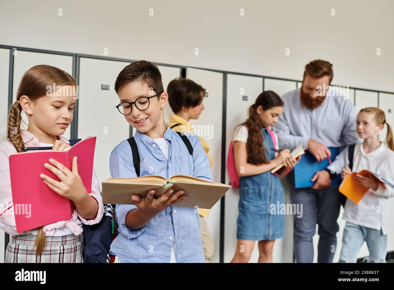A man teacher is instructing a diverse group of school children ...