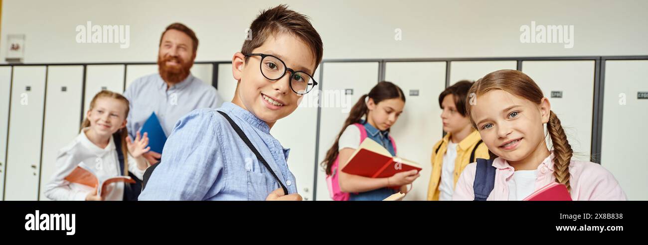 A male teacher is instructing a diverse group of kids in a bright ...