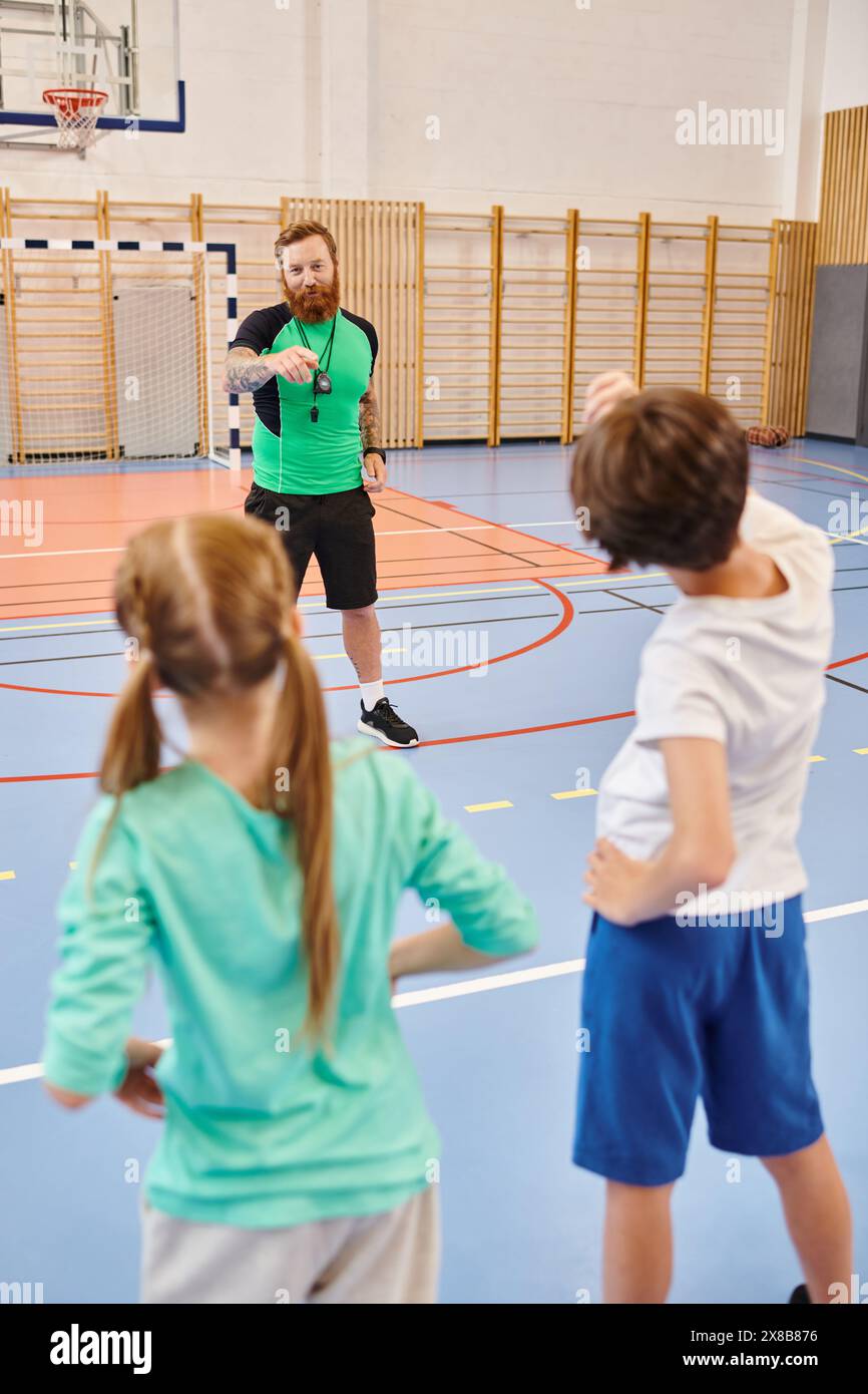 A diverse group of young people enthusiastically doing sport activities ...