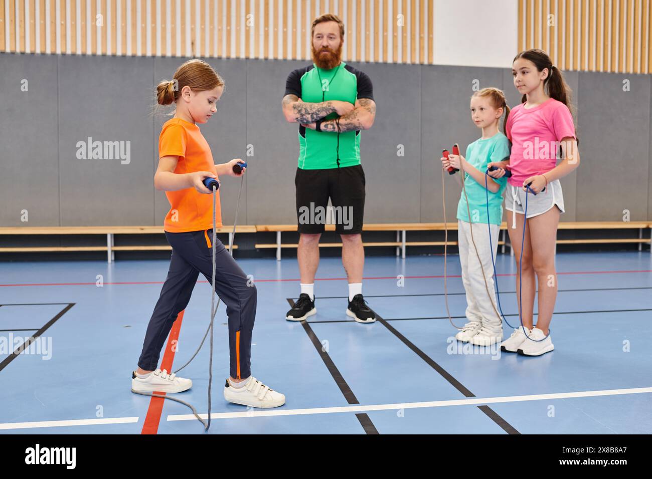 A diverse group of people, led by a man teacher, stand united on a ...