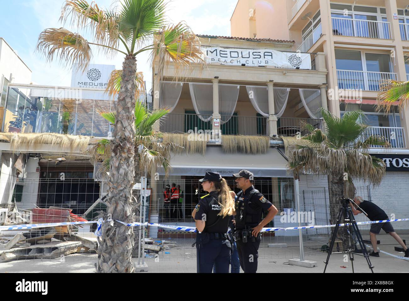 24 May 2024, Spain, Palma: Police officers stand in front of the Medusa ...