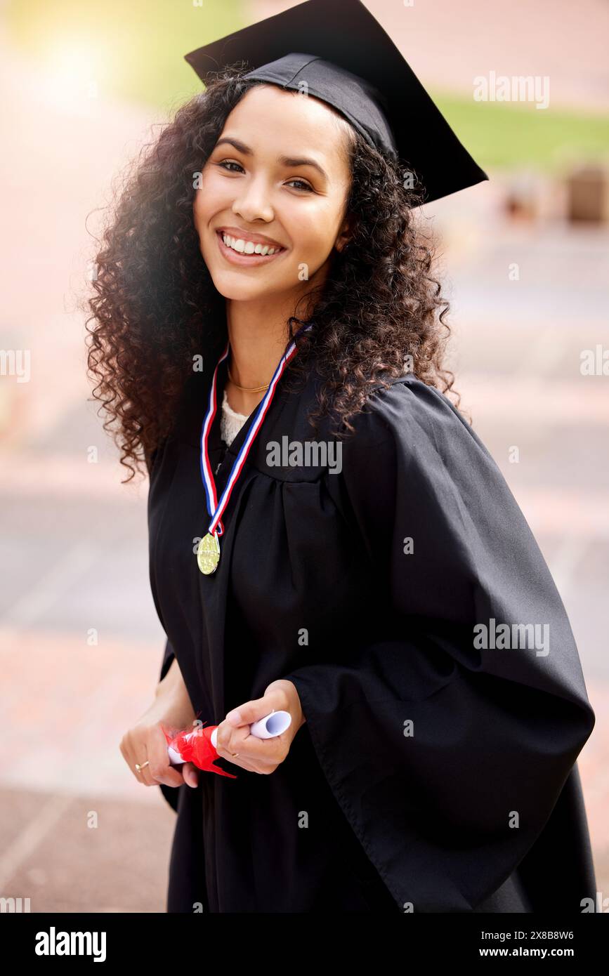 Woman, graduation and celebrate with medal and portrait, diploma and ...