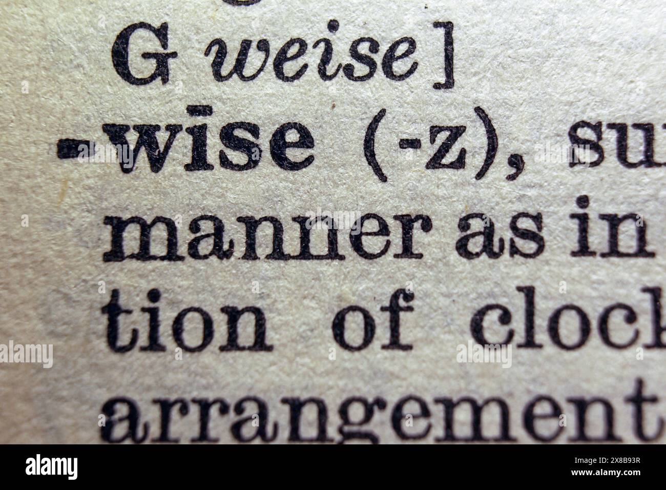 Word wise on dictionary page, macro close-up Stock Photo - Alamy