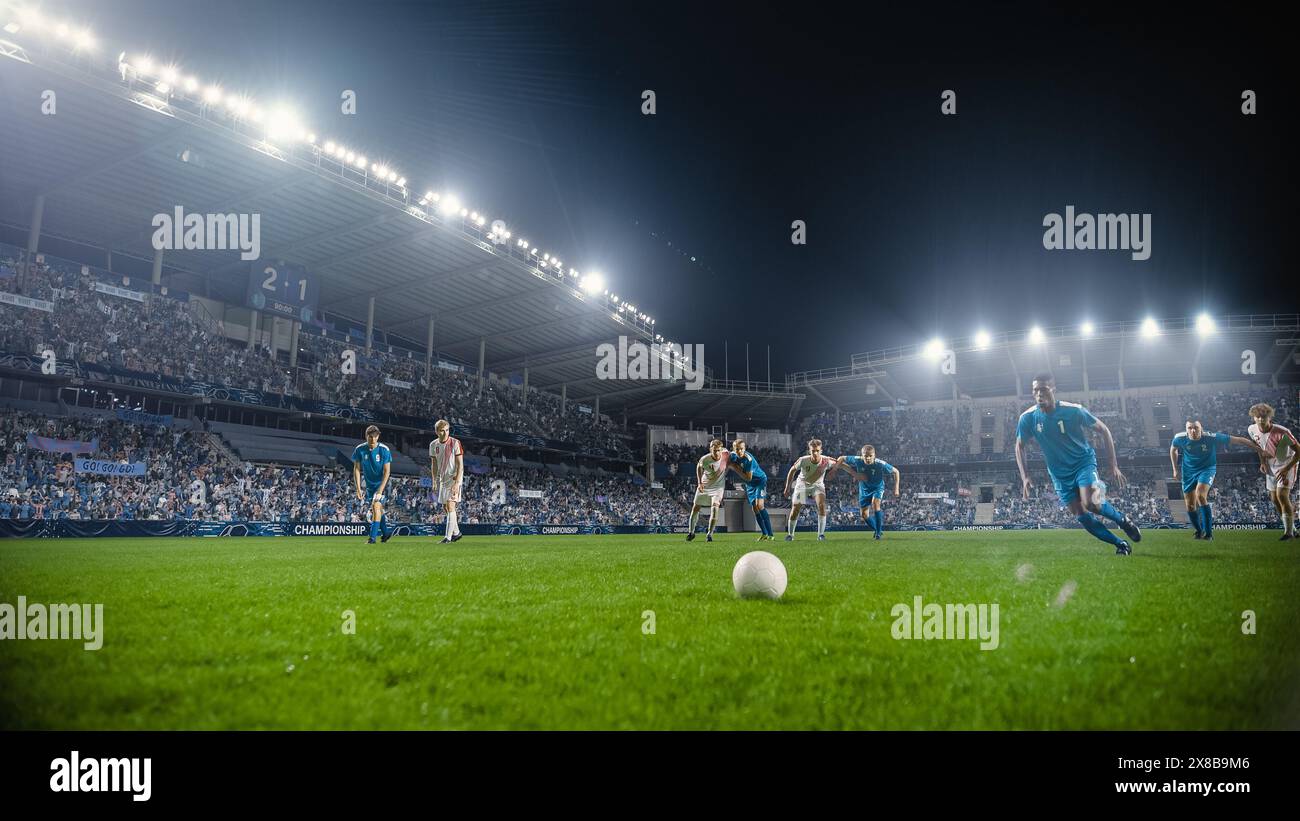 Football Championship: Blue Team Forward Hits the Ball and Scores ...