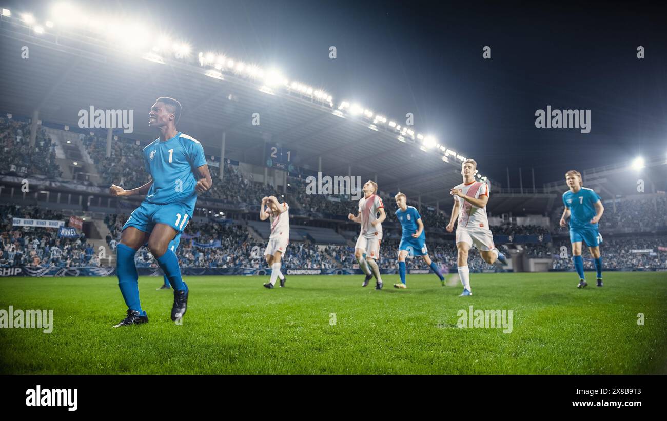 Football Championship: African Blue Team Forward Hits the Ball and ...