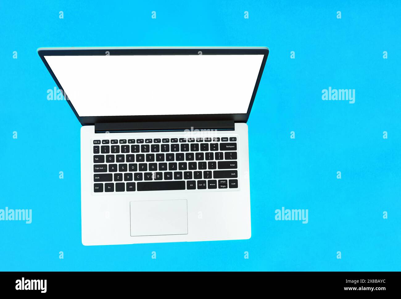 Top view of a business working place with laptop, empty workspace on a ...