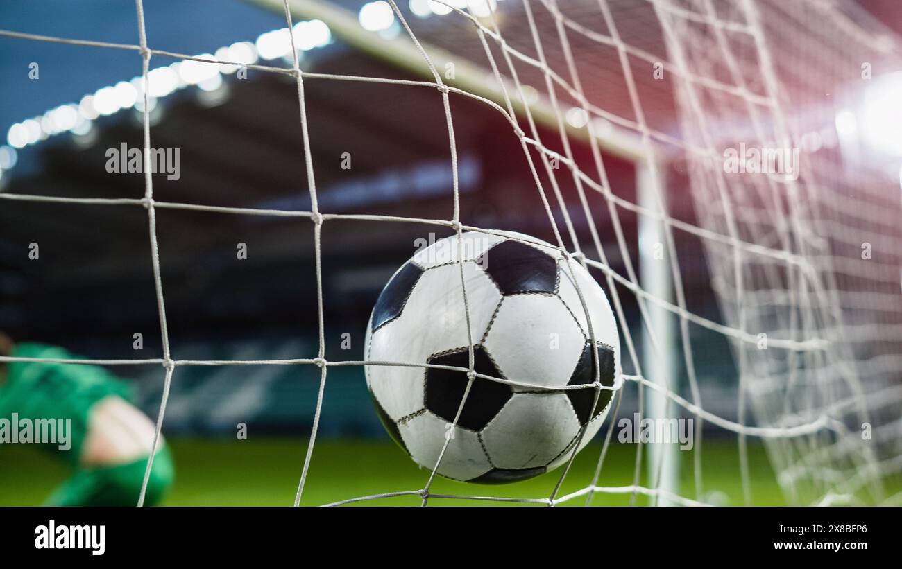 Football Championship: Ball Hits the Net. Goalkeeper Jumps and Fails to ...