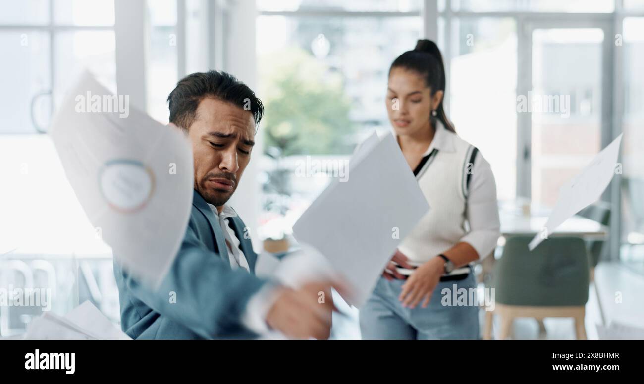 Man, falling and paperwork in busy toxic office with accident, crash ...