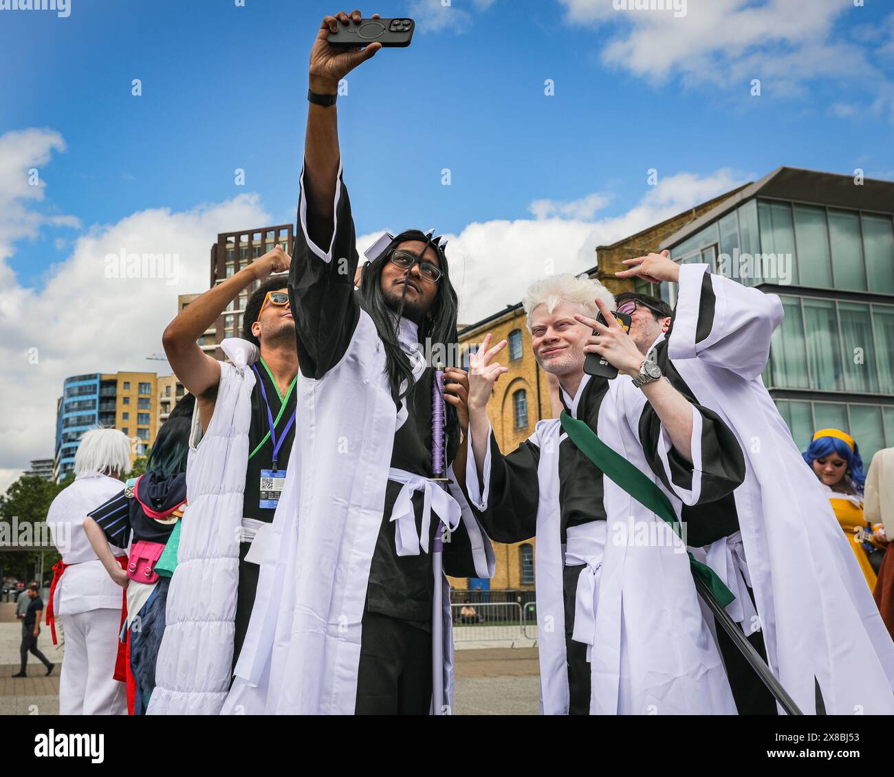 London, UK. 24th May, 2024. A group of Squad Captains from "Bleach" pose and take selfies in ...