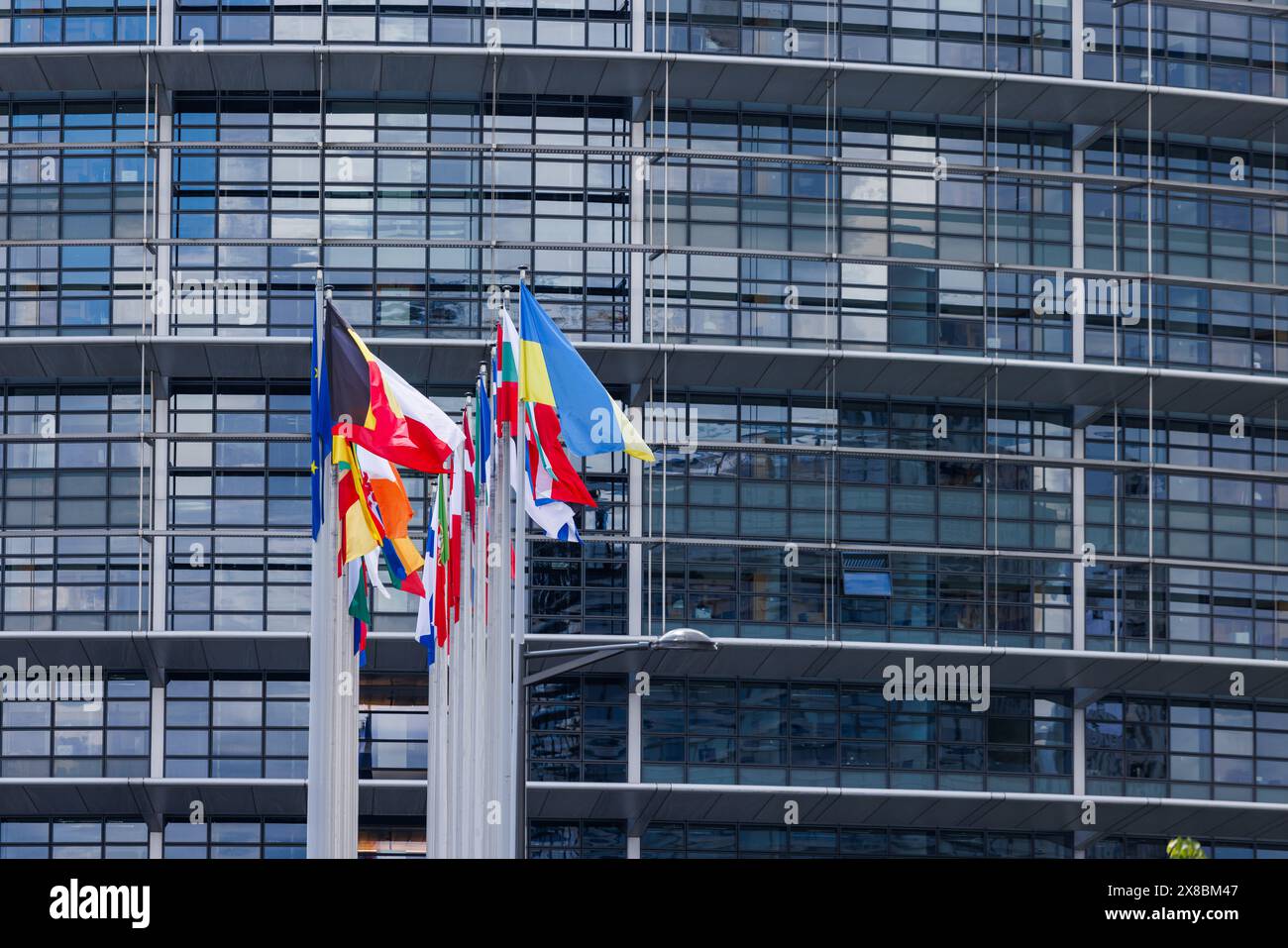24 May 2024, France, Straßburg: The flags of the European Union, its ...