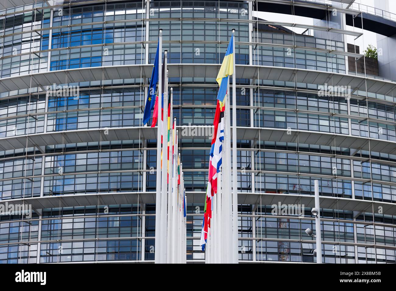 24 May 2024, France, Straßburg: The flags of the European Union, its ...