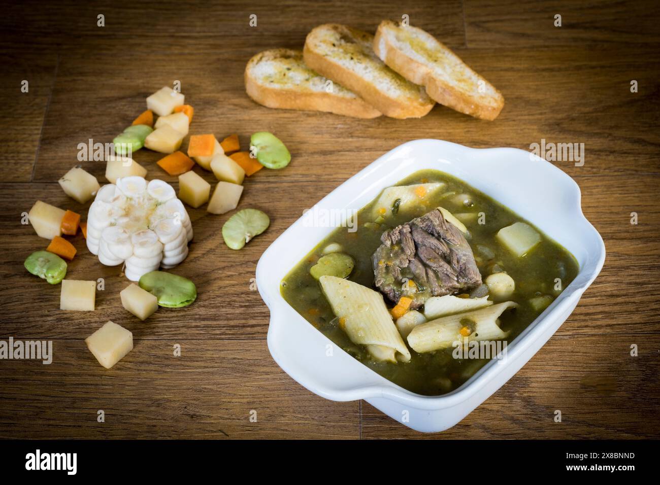 A bowl of Peruvian menestron soup. With chunks of meat, noodles ...