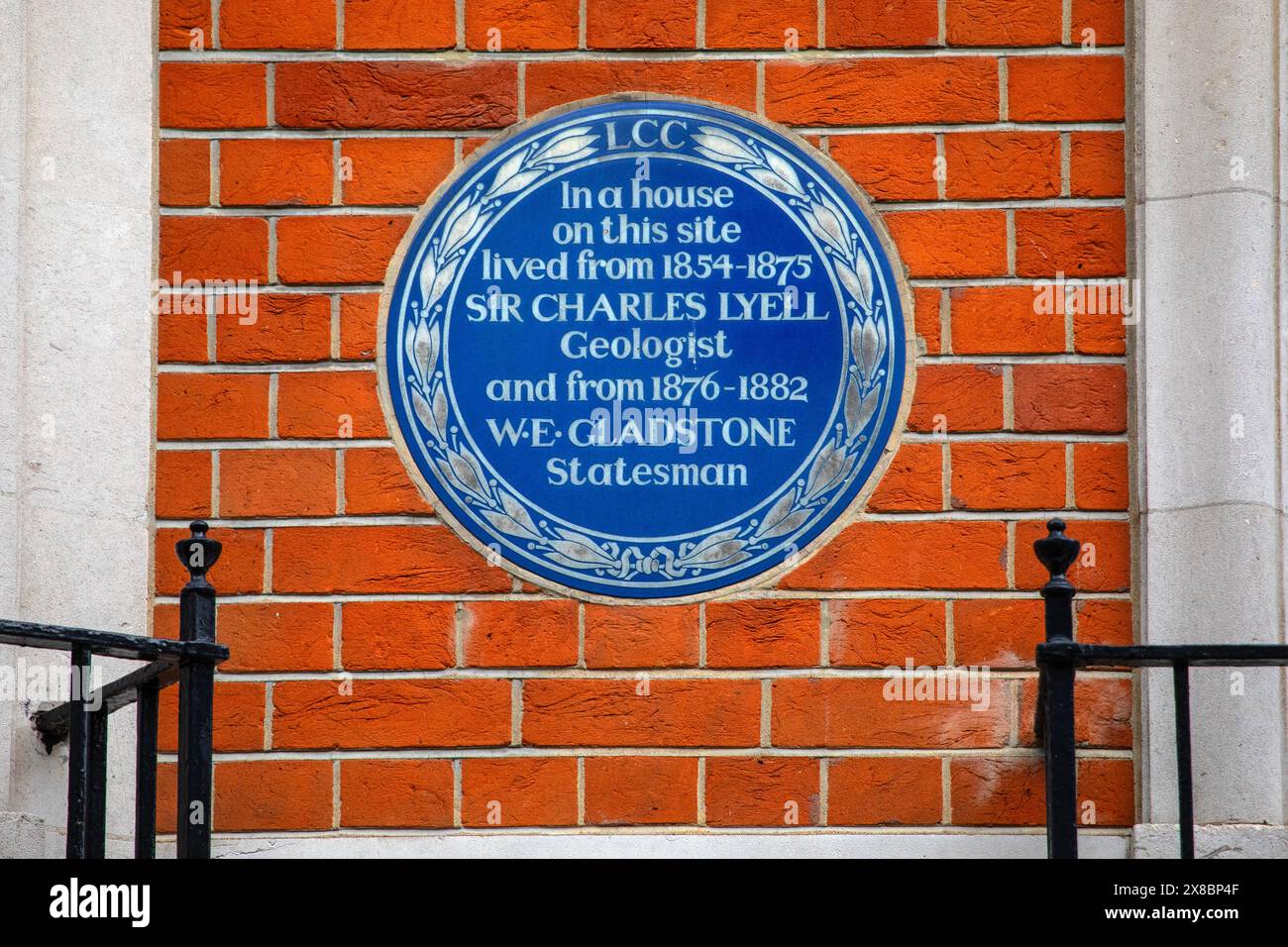 London, UK - March 18th 2024: A plaque on Harley Street in London ...