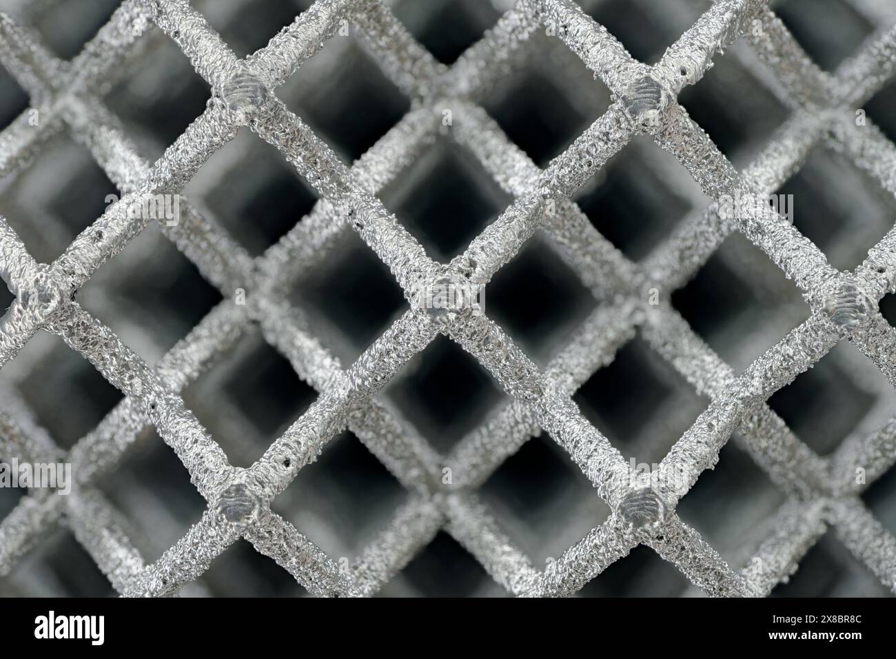 Three-dimensional openwork lattice, 3D-printed metal grid. Abstract ...