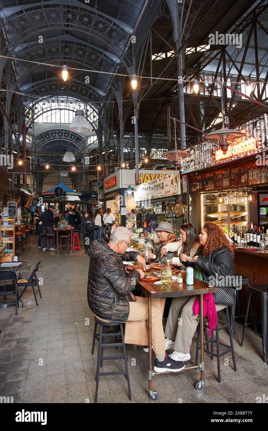 People eating inside the San Telmo Market (Mercado de San Telmo ...