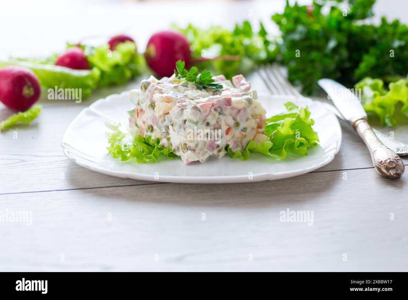 vegetable salad with boiled vegetables and dressed with mayonnaise ...