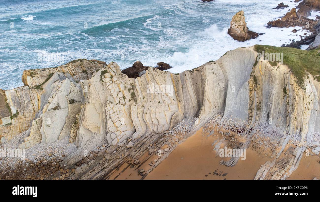 Aerial view of Portio Beach, distinctive white sharp cliffs made of ...