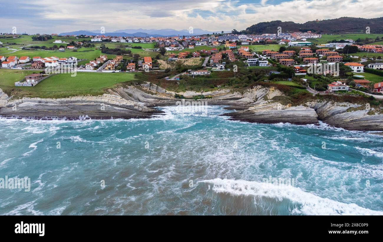 Aerial view of the coastline with unusual layered rock formations, the ...