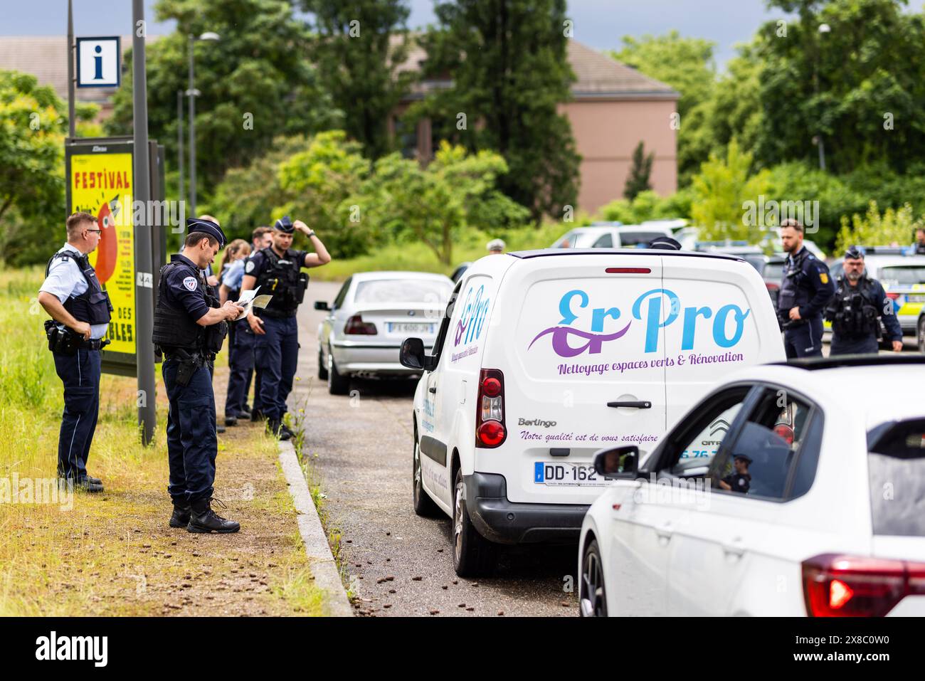 24 May 2024, France, Straßburg: Cars are parked in a parking lot ...