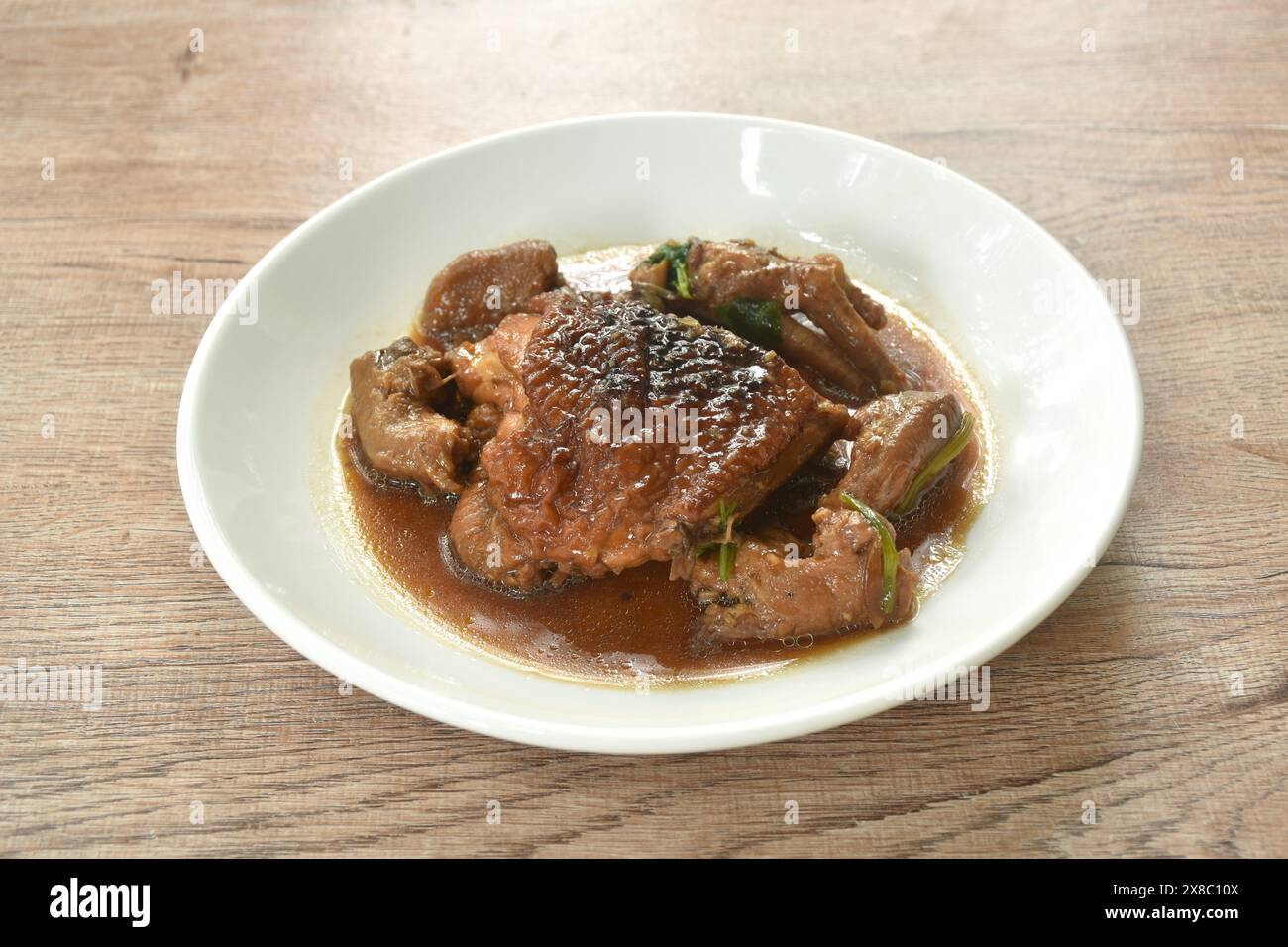 steamed chicken thigh and feet with garlic black pepper gravy sauce ...