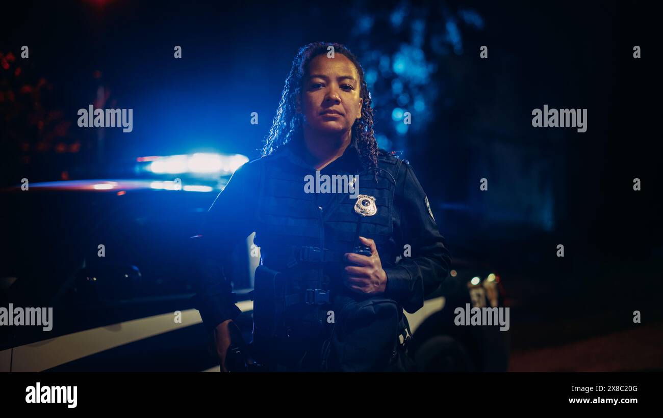 Professional Black Female Police Officer Looking at the Camera ...