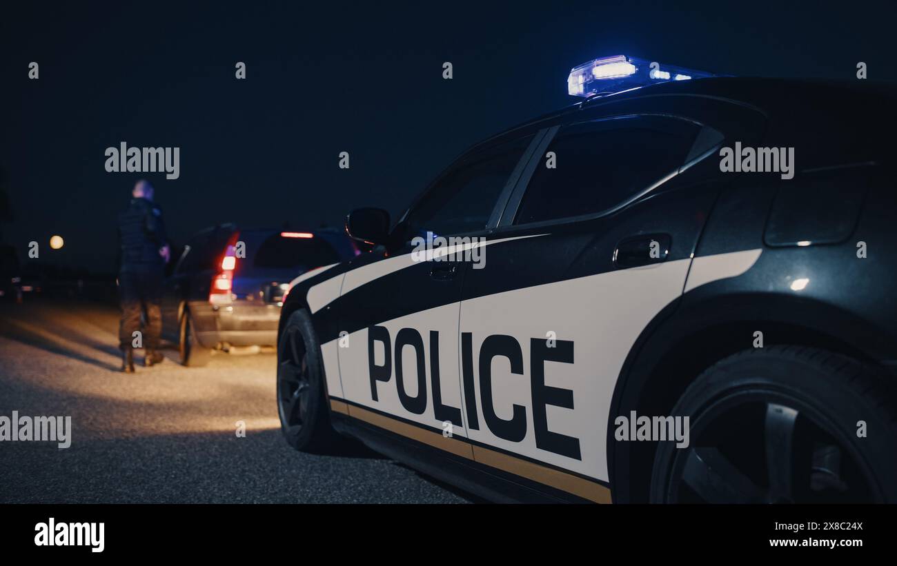 Portrait of Middle Aged Caucasian Cop Approaching a Pulled Over Vehicle ...