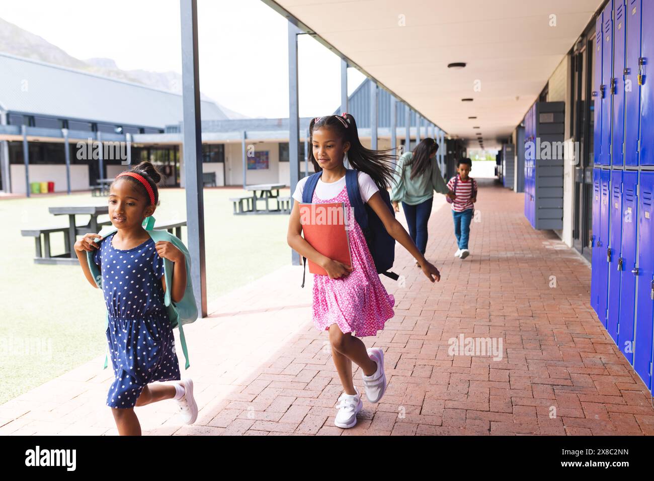 Kid student walks to teacher hi-res stock photography and images - Alamy