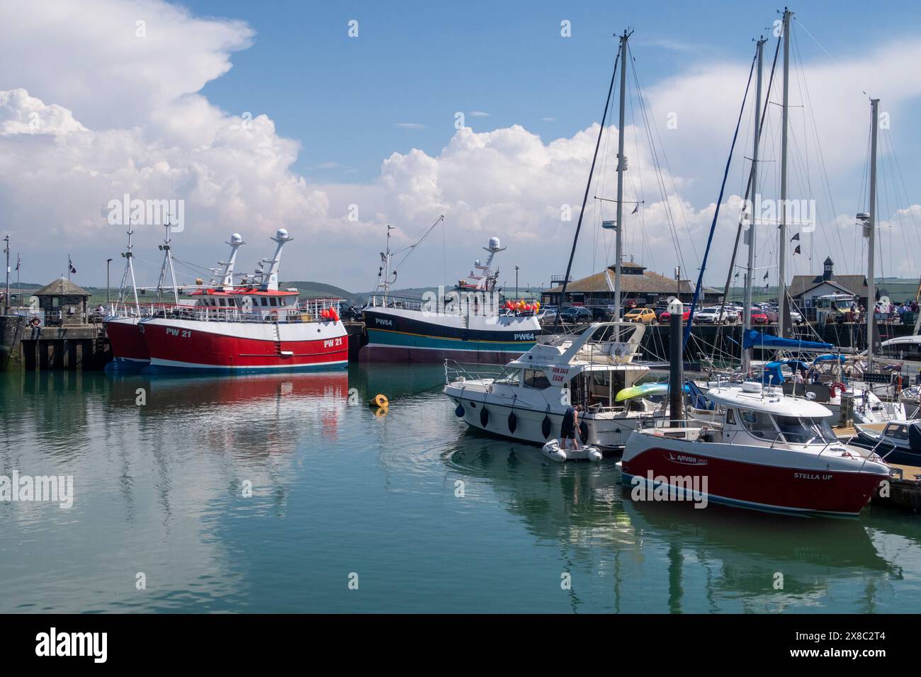 Boats moored at the harbour in Padstow, Cornwall. The fishing village ...