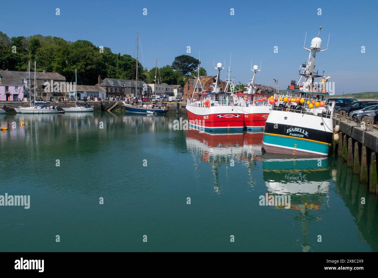 Boats moored at the harbour in Padstow, Cornwall. The fishing village ...