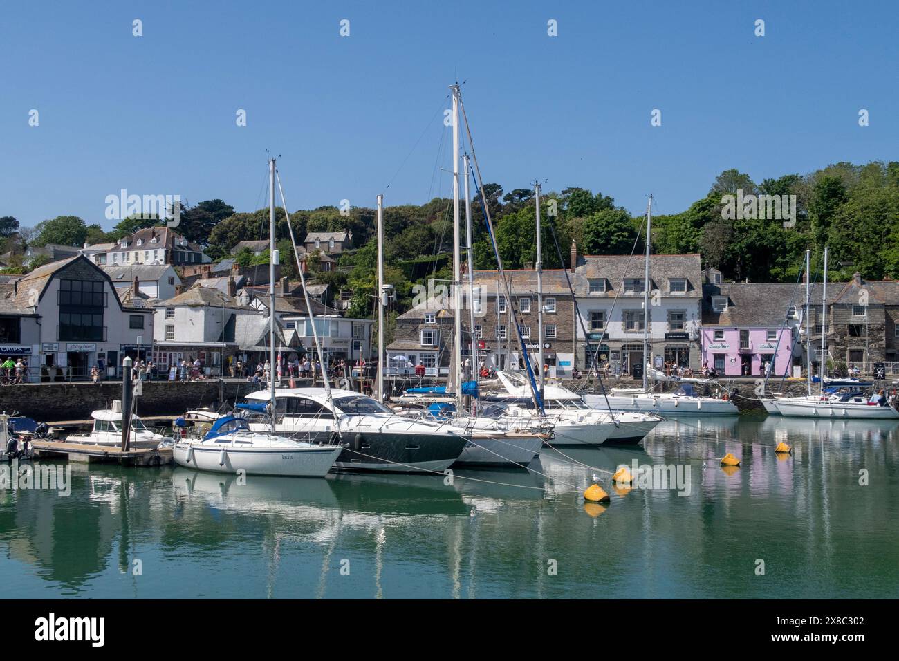 Boats moored at the harbour in Padstow, Cornwall. The fishing village ...