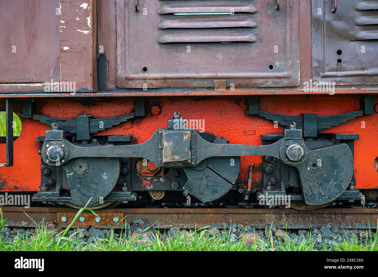 detail of wheels, transmission mechanism and suspensions of an old and ...