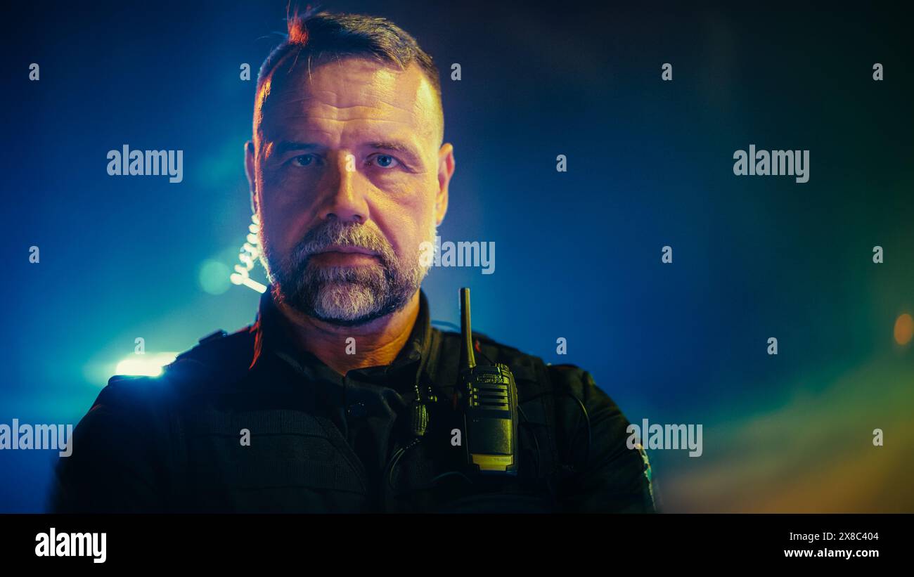 Male police officer standing arms hi-res stock photography and images ...